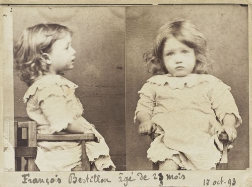 Adorable toddler mug shot | The Museum of Ridiculously Interesting Things