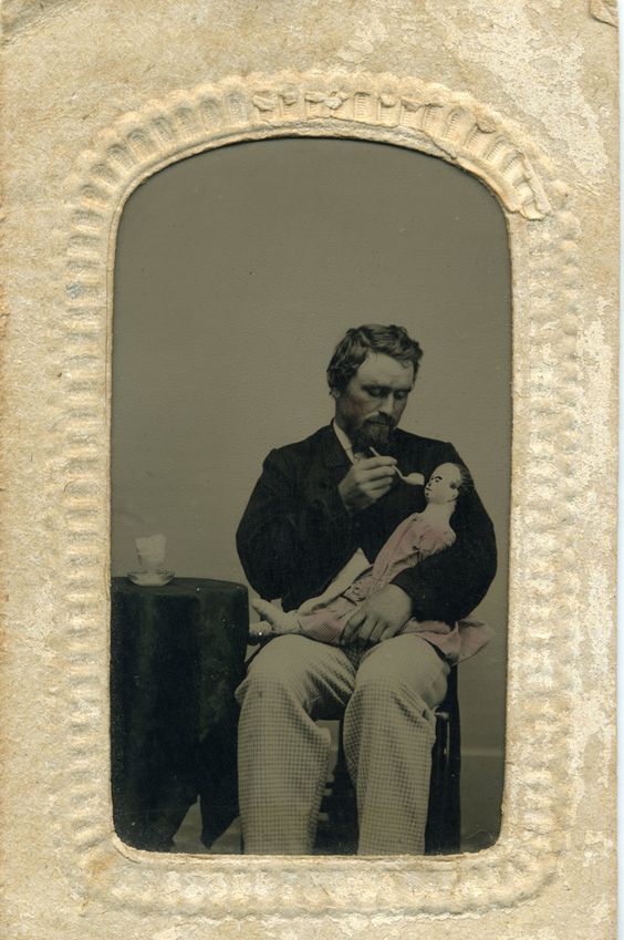 Bizarre picture of a man feeding a doll | The Museum of Ridiculously ...